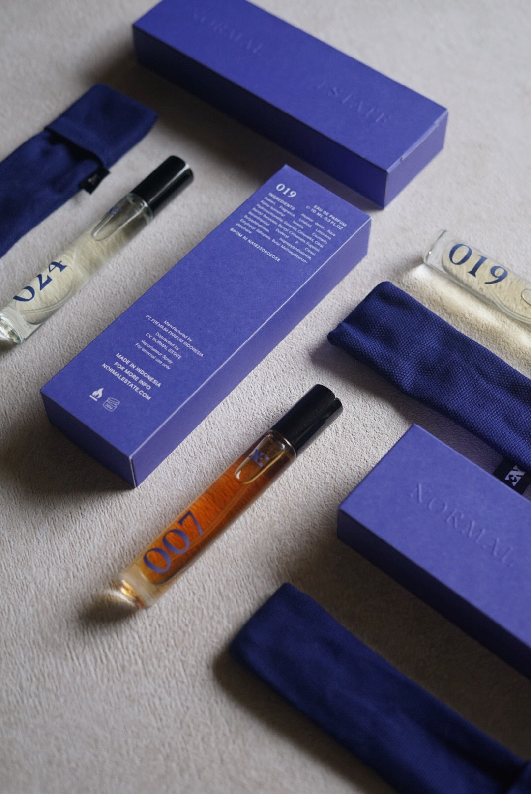 019 | Eau de Parfum (10 ml) – Normal Estate